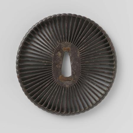 Tsuba Definition, Meaning & Usage | FineDictionary.com